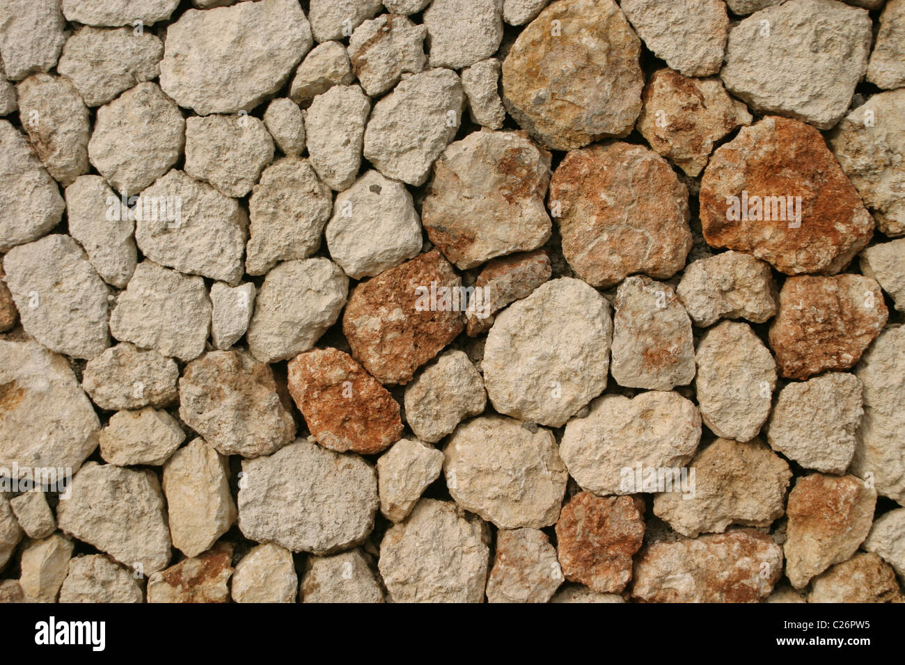 Rock retaining wall Stock Photo - Alamy