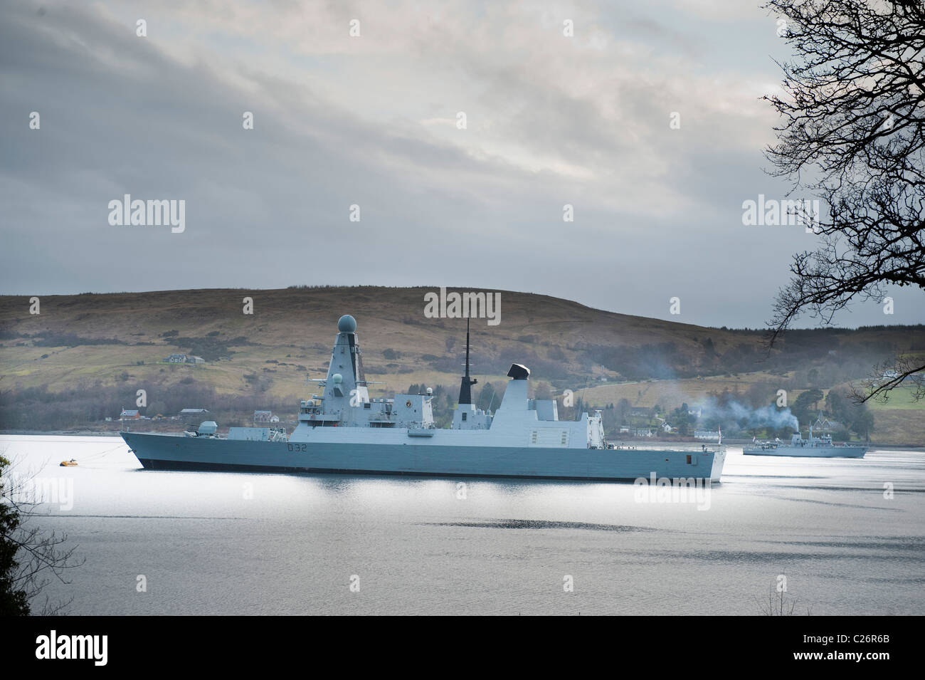 HMS Daring moored at Faslane with a Hunt class mine hunter passing ...