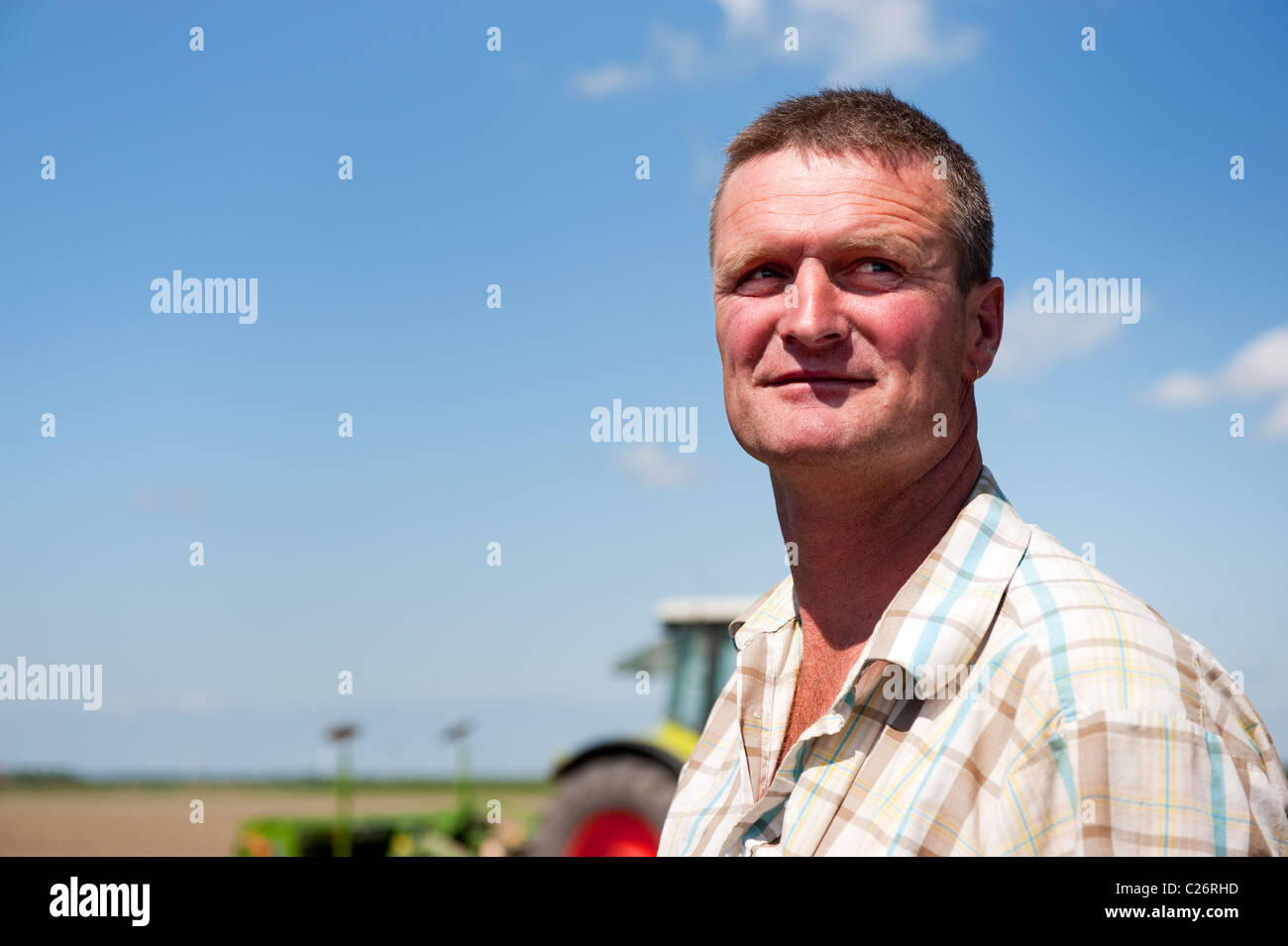 Farmer is working outdoor in the agriculture fields Stock Photo - Alamy