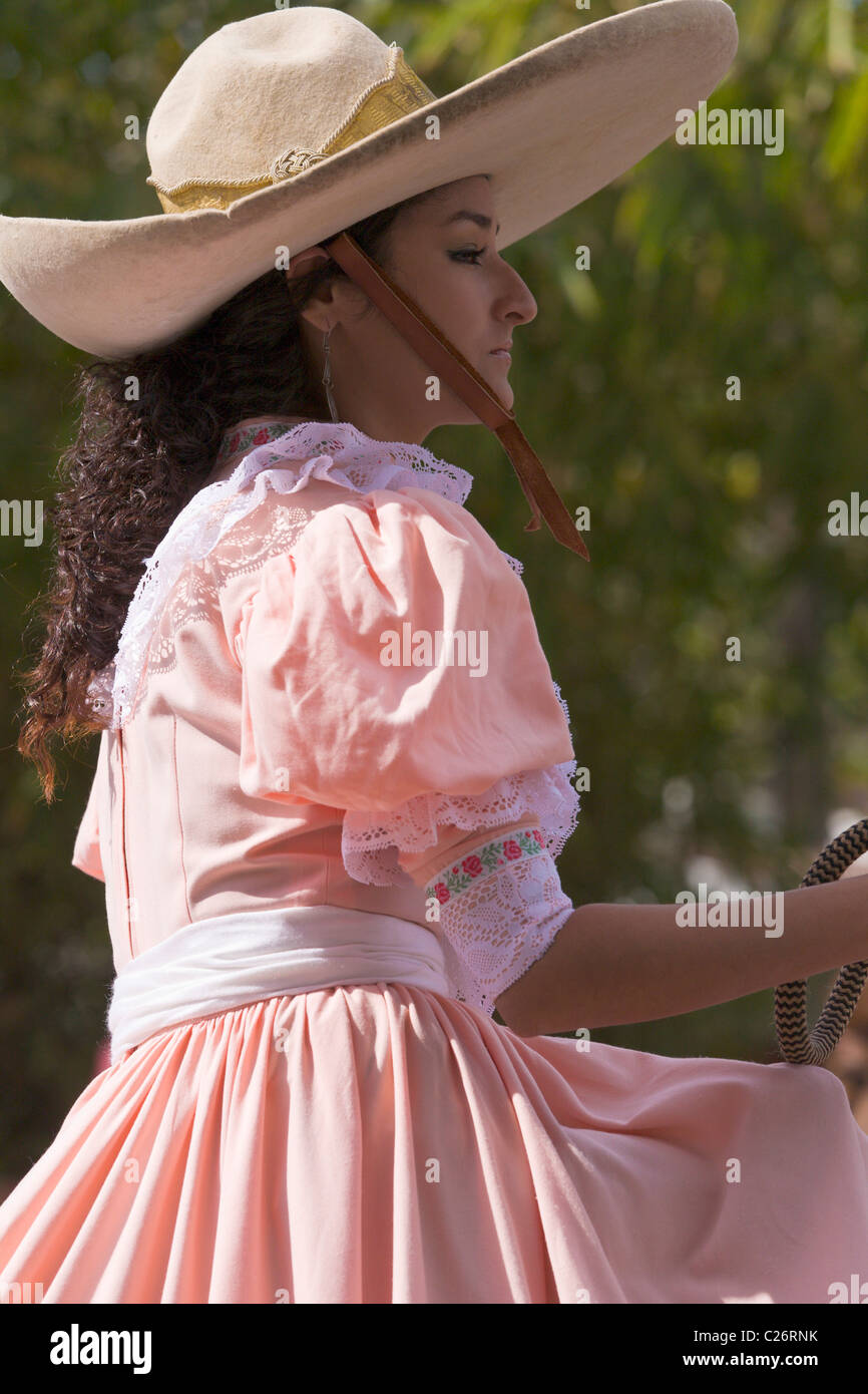 Mexican girl on horseback riding through Puerto Vallarta, Jalisco ...