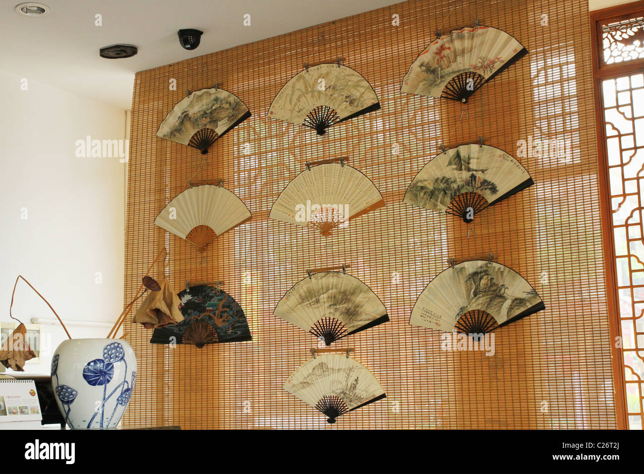 Chinese Fans on bamboo screen for sale. Tea House at Shanghai Jinqiao ...