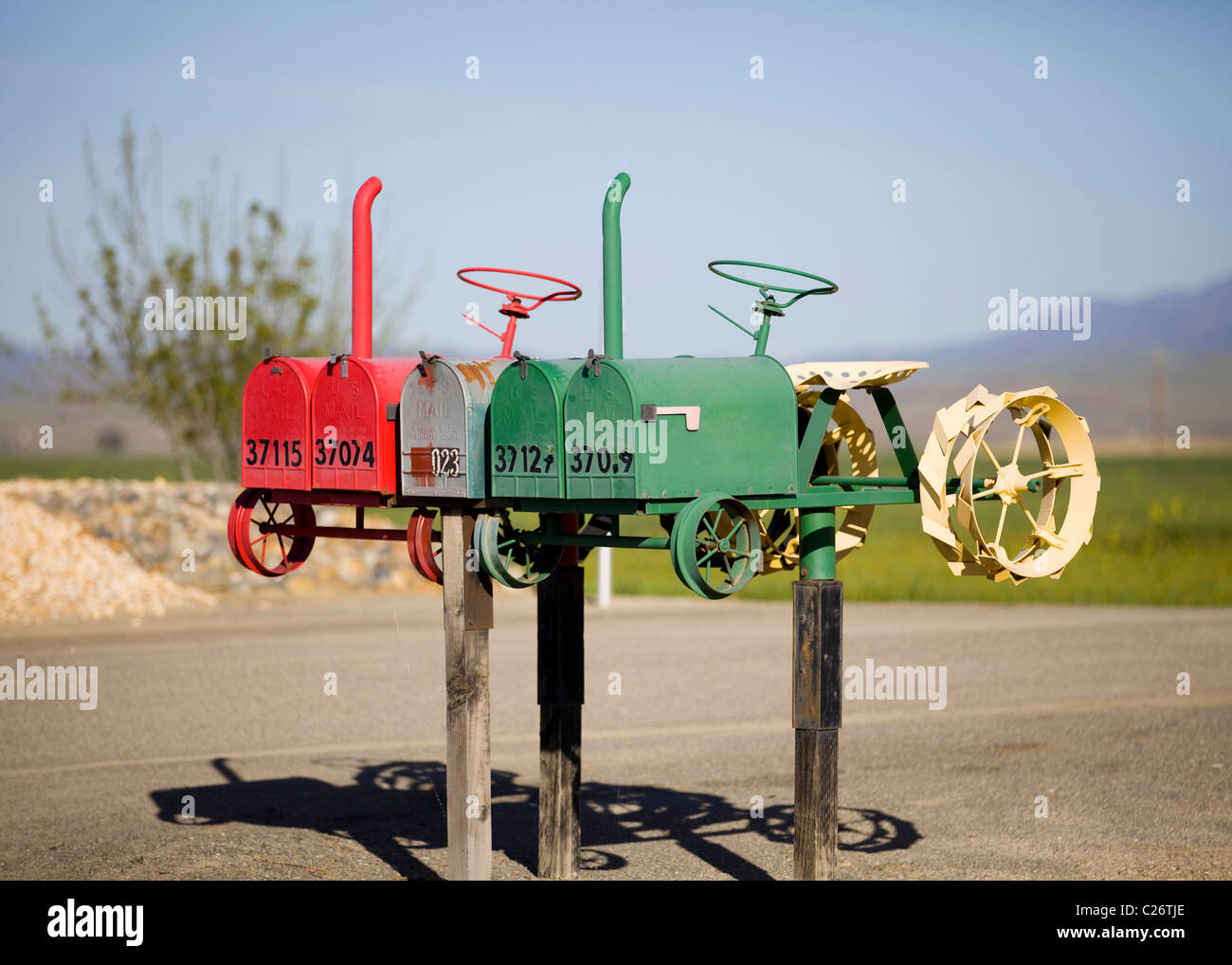 Cleverly designed farmhouse post boxes Stock Photo - Alamy