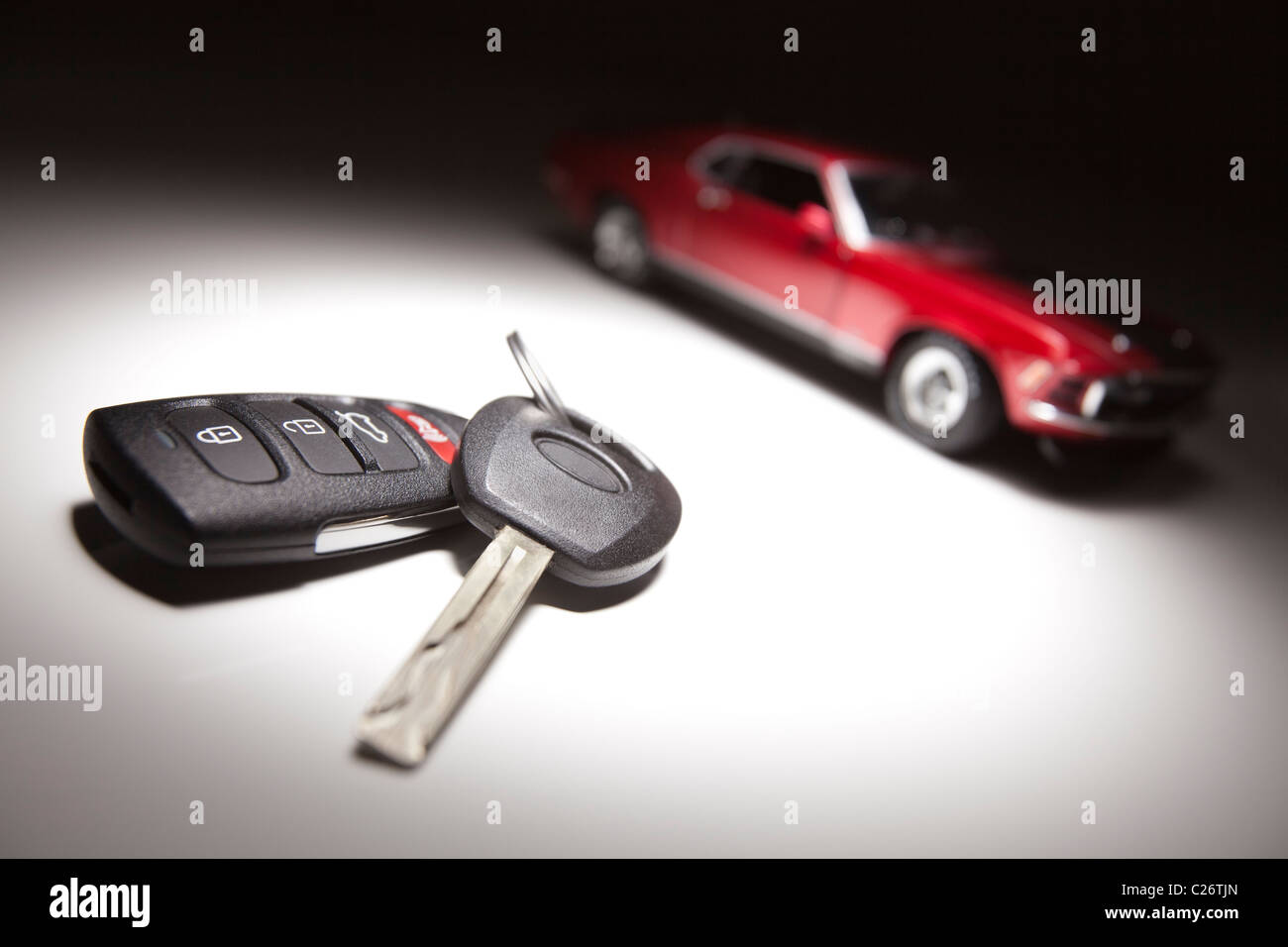 Car Keys and Sports Car Under Spot Light Stock Photo - Alamy