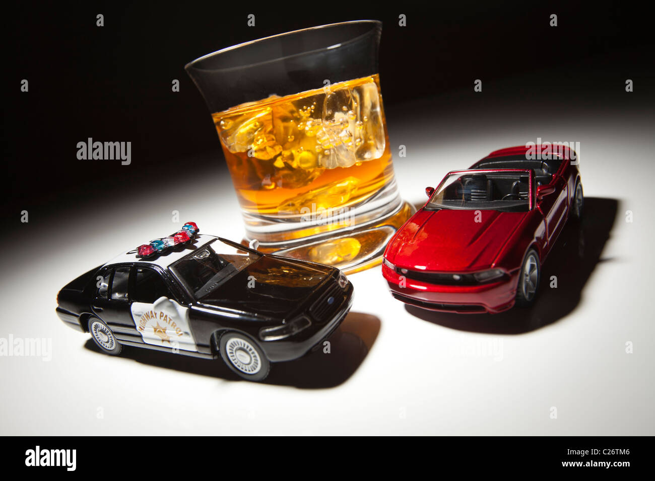 Police and Sports Car Next to Alcoholic Drink Under Spot Light Stock ...