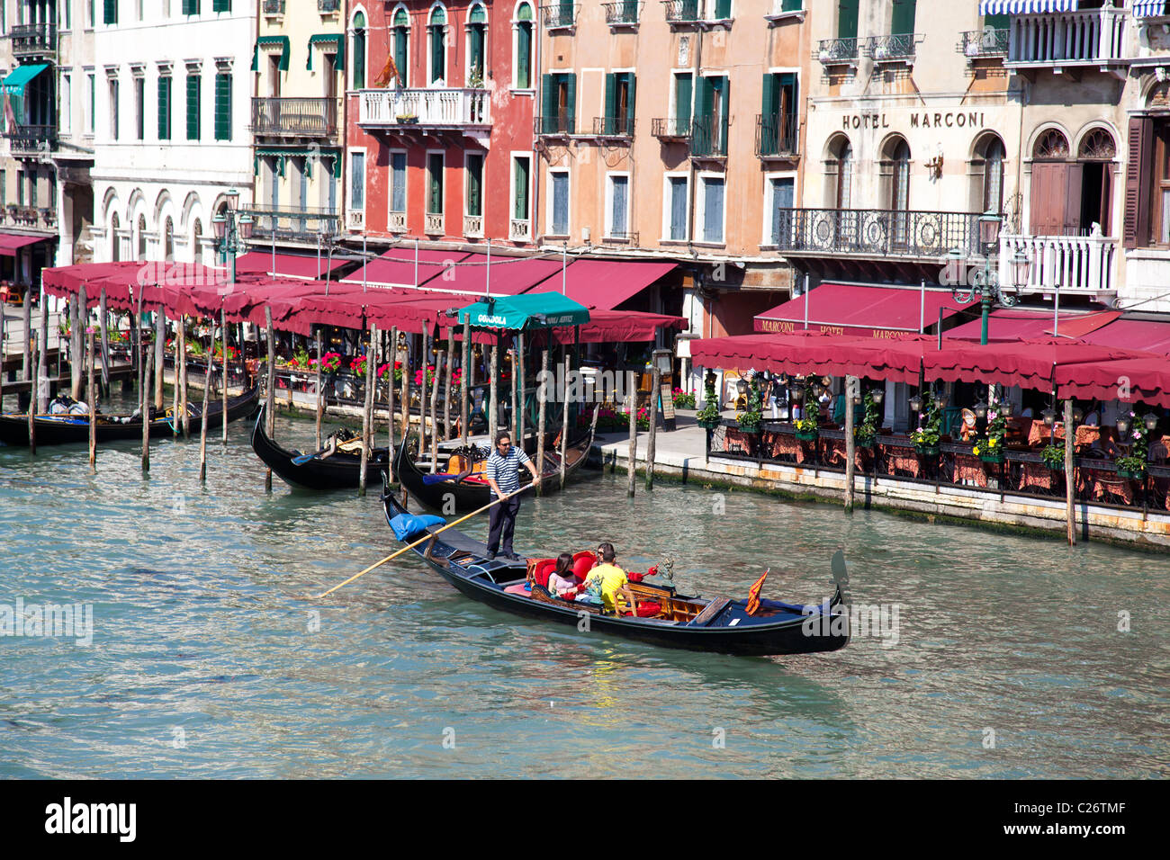 Gondola moving along the Grand Canal in Venice Italy Stock Photo - Alamy