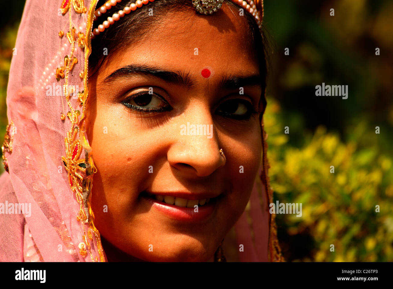 Indian girl smiling - portrait Stock Photo - Alamy