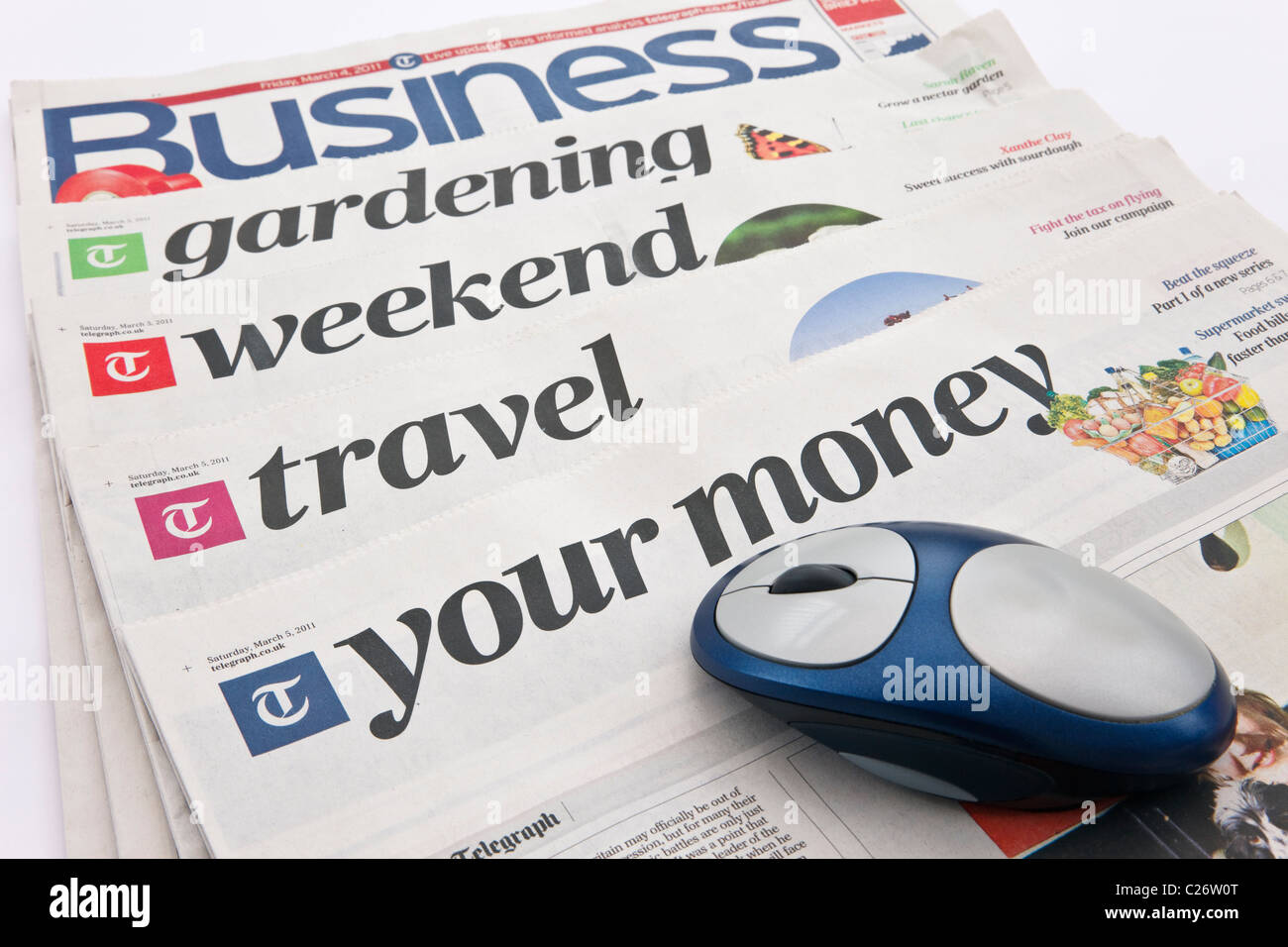 Saturday Telegraph newspaper supplements with a computer mouse to ...