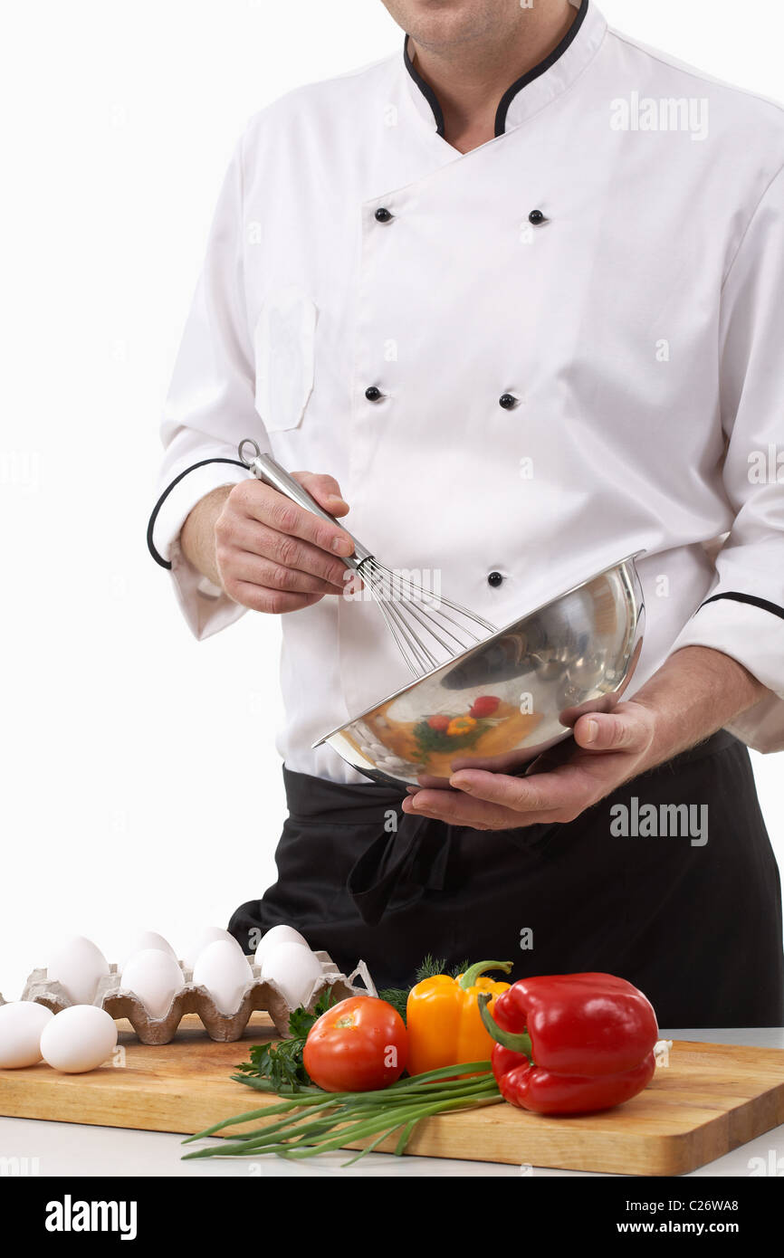 Image of a cook mixing ingredients Stock Photo - Alamy