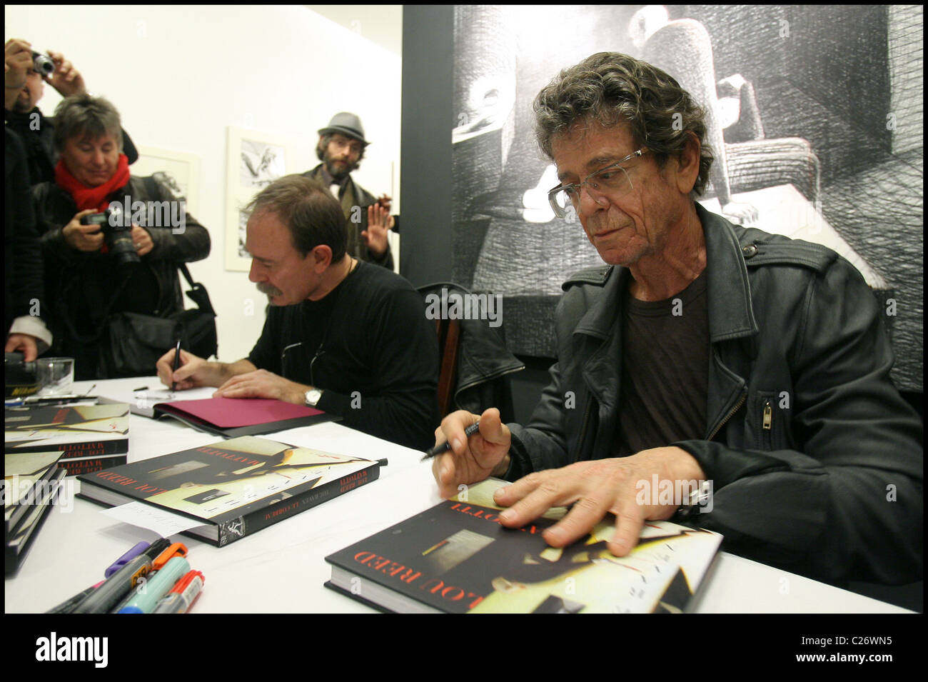 Singer Lou Reed and drawing artist, Lorenzo Mattotti book signing of ...