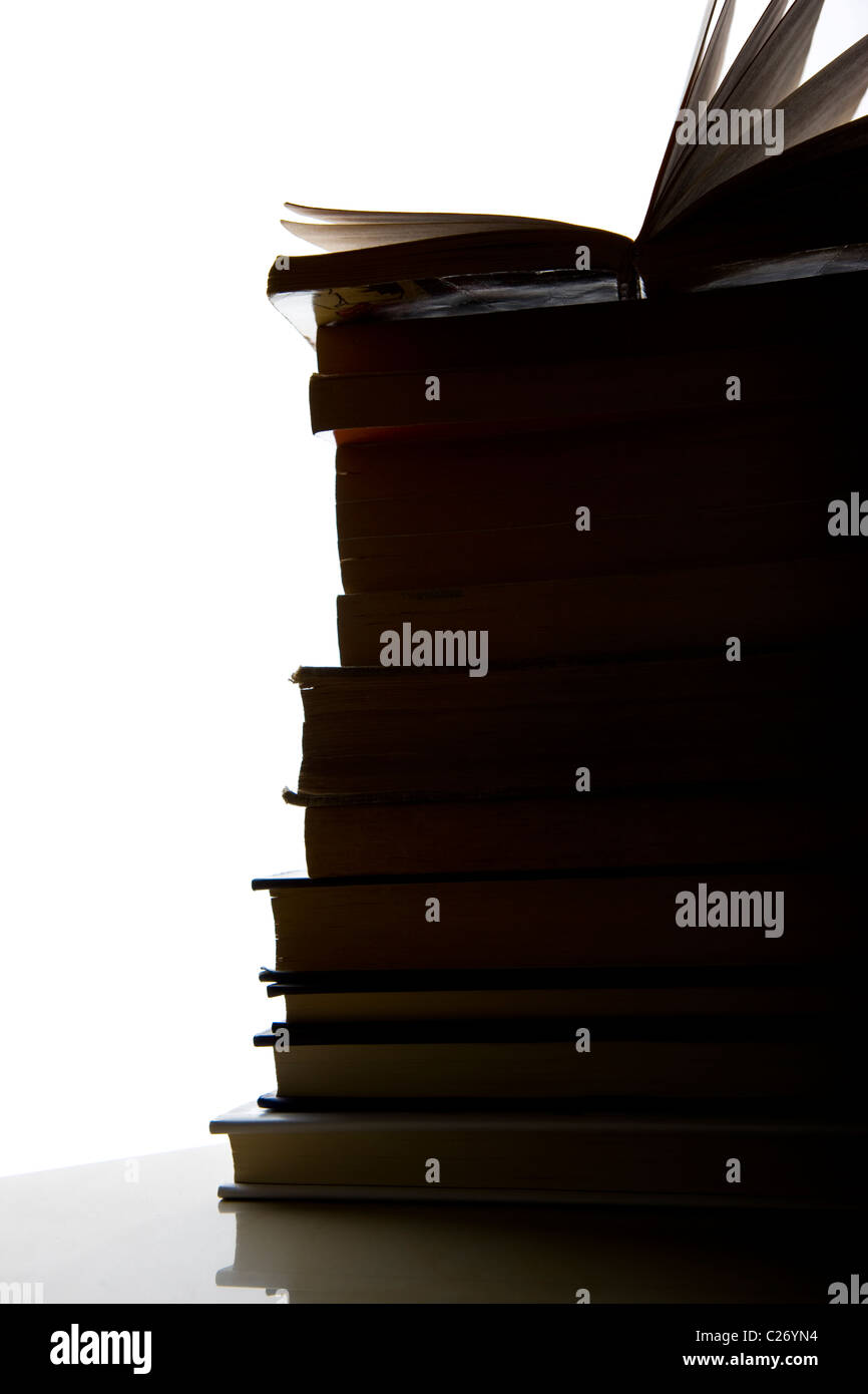 Stacking up books hi-res stock photography and images - Alamy