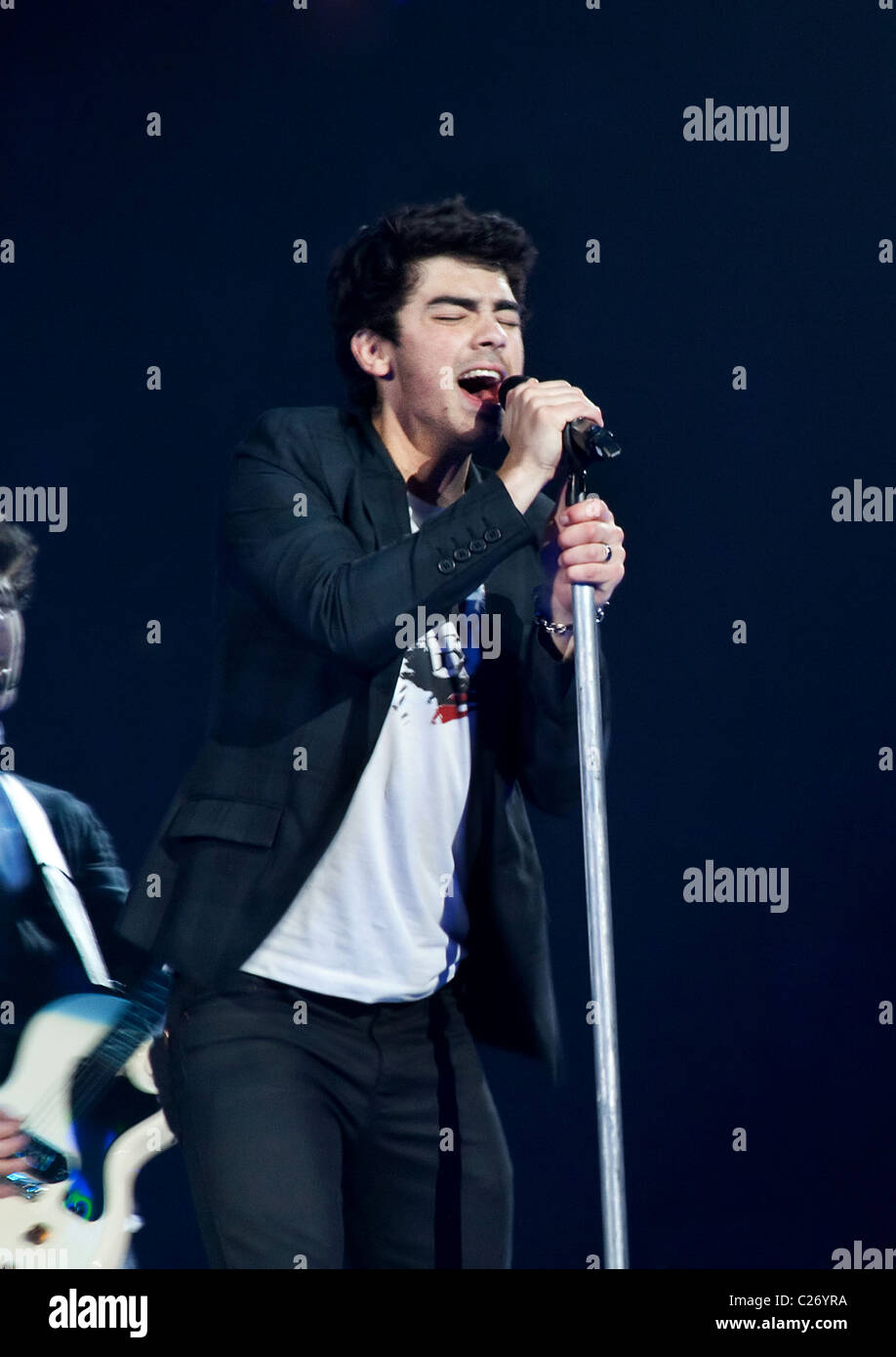 Joe Jonas of the Jonas Brothers performing live in concert at the ...