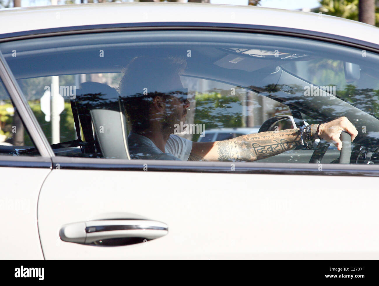 David Beckham shows off his new silver Bentley car in Beverly Hills Los ...