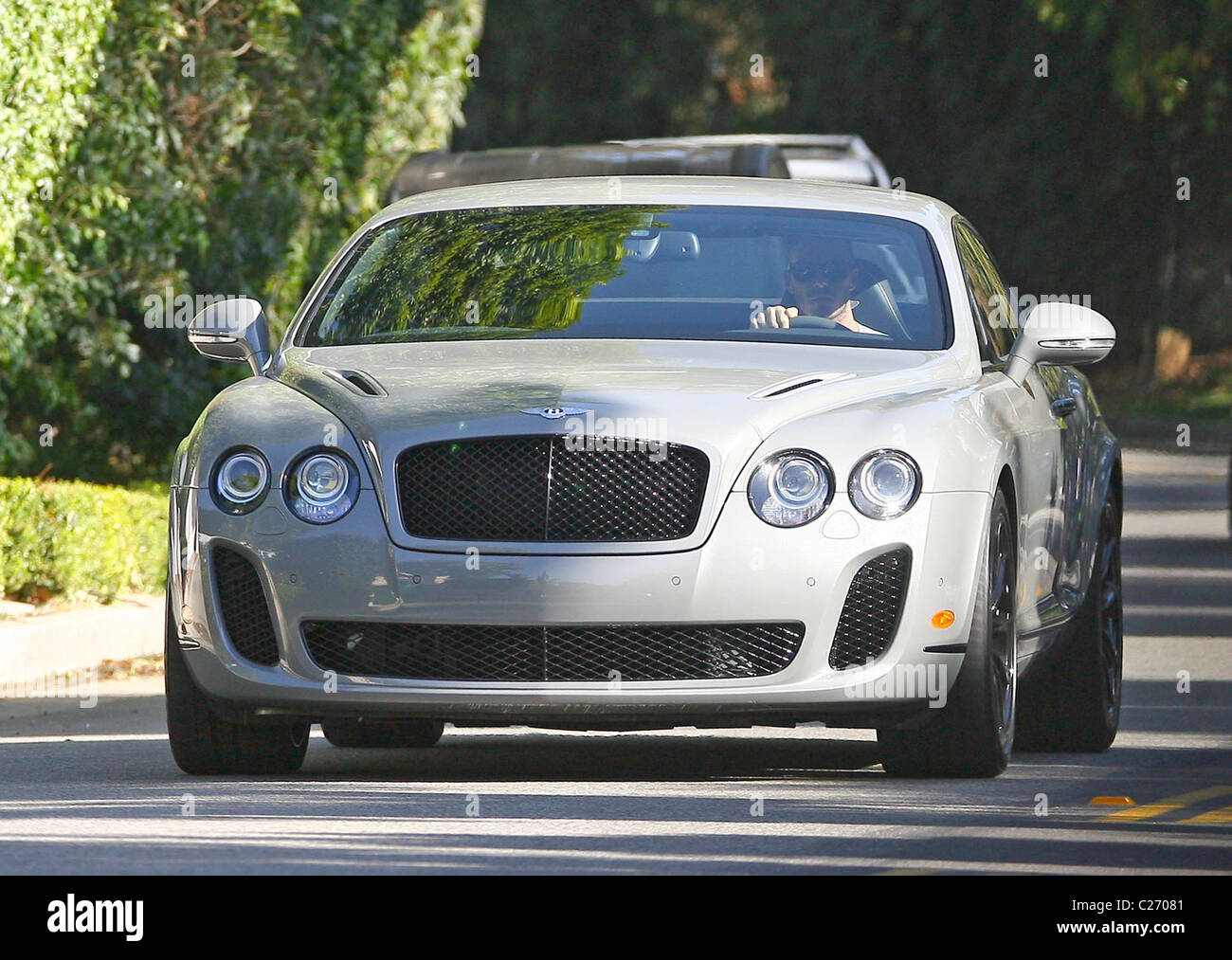 David Beckham shows off his new silver Bentley car in Beverly Hills Los ...