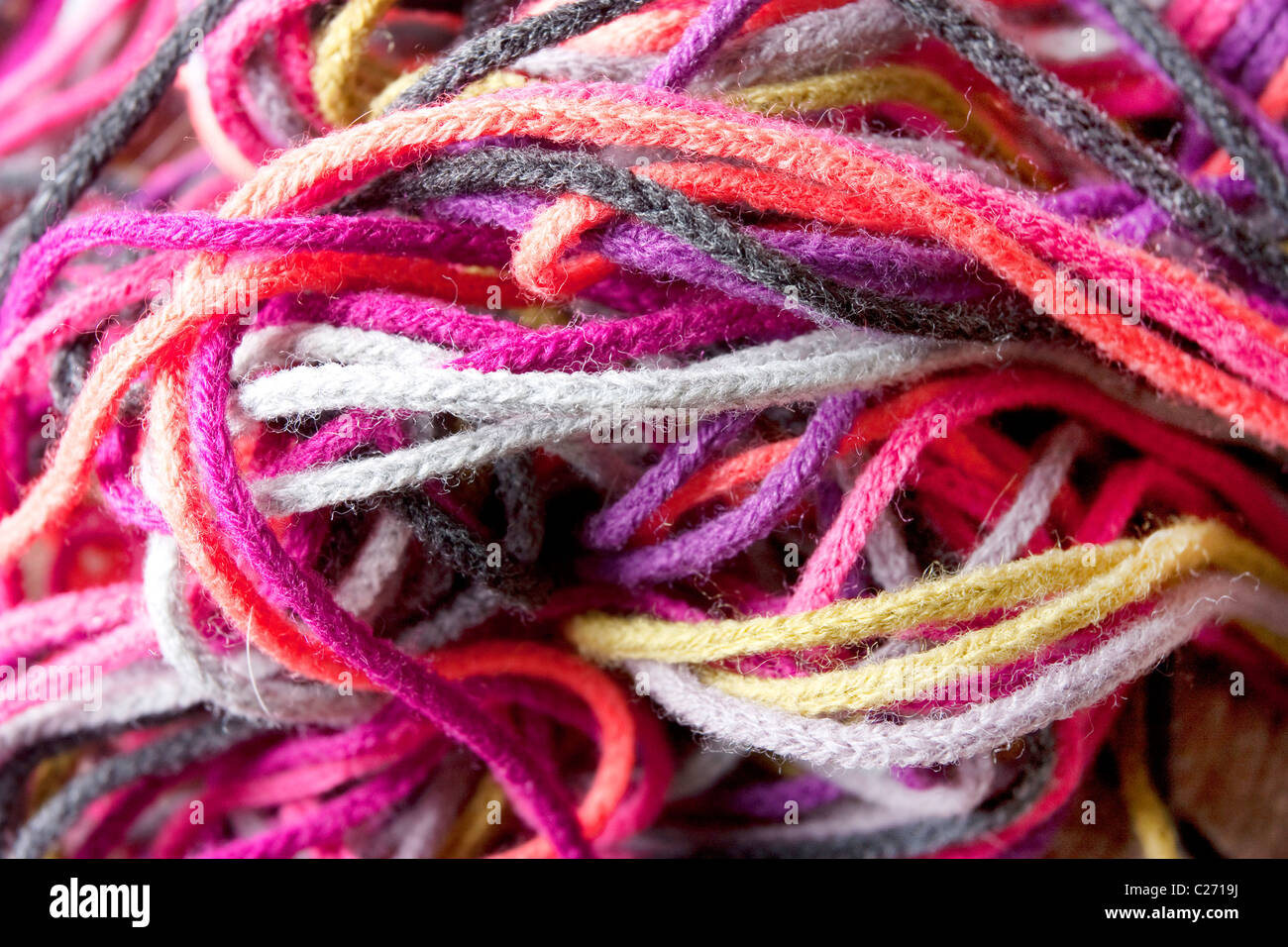 different colours of striped wool starnds as a background texture Stock ...