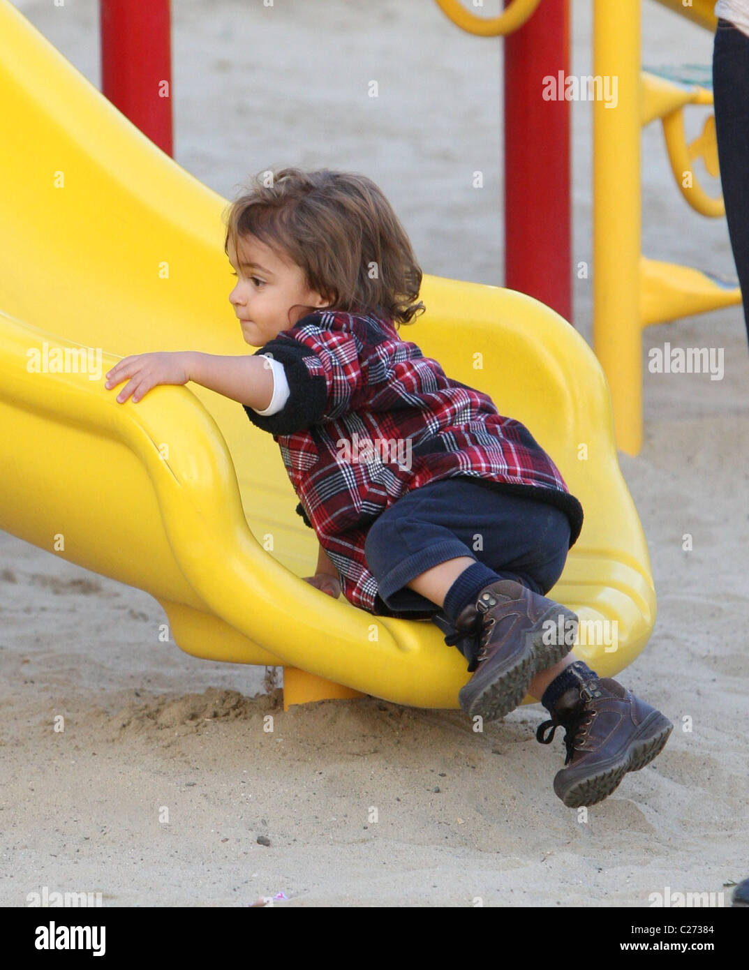 Levi Alves McConaughey plays on the slide at Cross Creek Park in Malibu ...