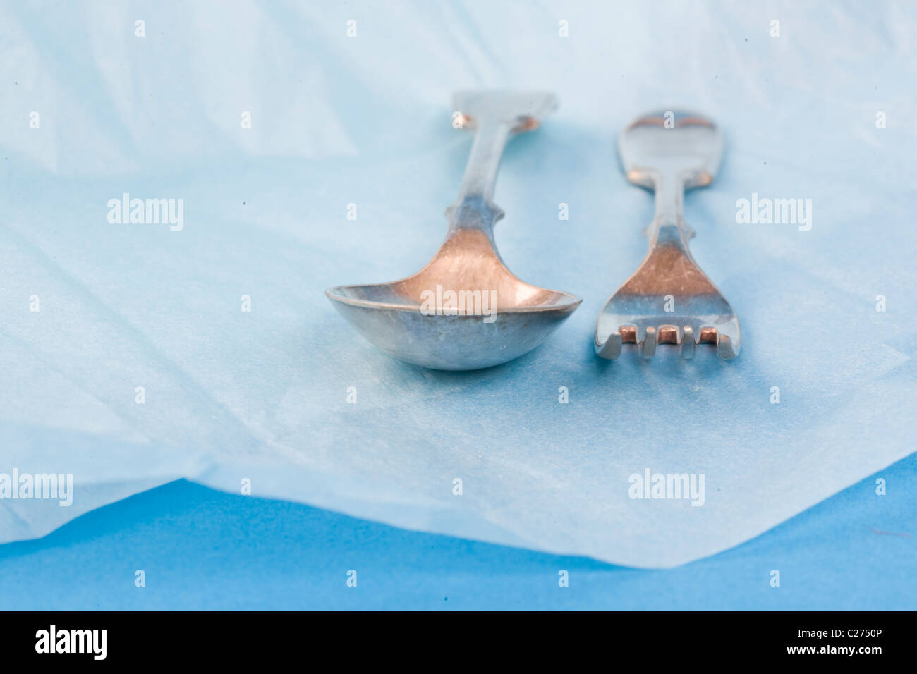 Fork and Spoon on White Tissue Paper Stock Photo - Alamy