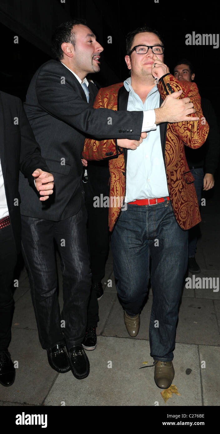 Alan Carr is hassled by a male fan as he leaves Jalouse Club after ...