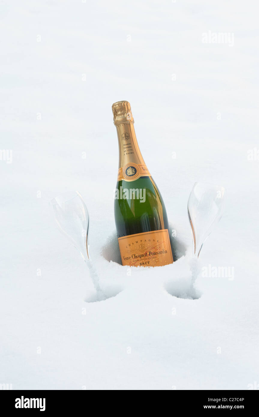 Bottle of Champagne in Snow with Two Glasses (centre of frame version ...