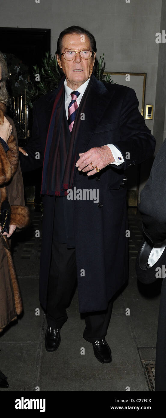 Roger moore, michael caine hi-res stock photography and images - Alamy