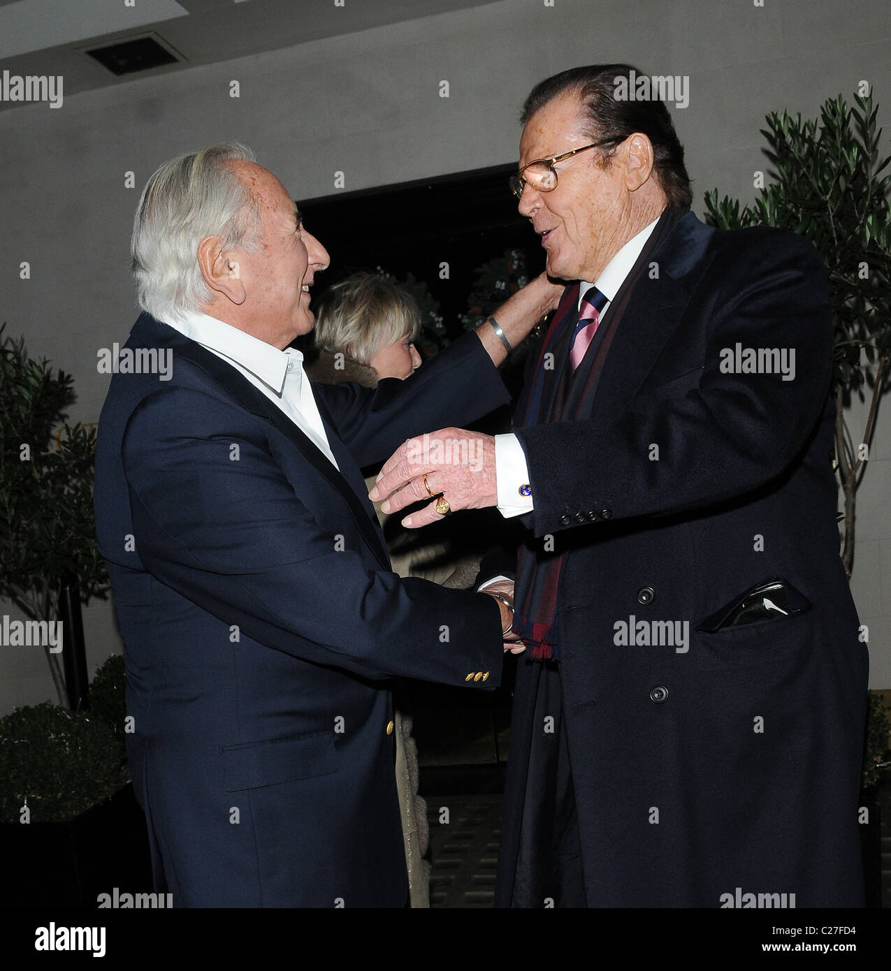 Roger Moore and Michael Winner leaving Scott's restaurant London ...