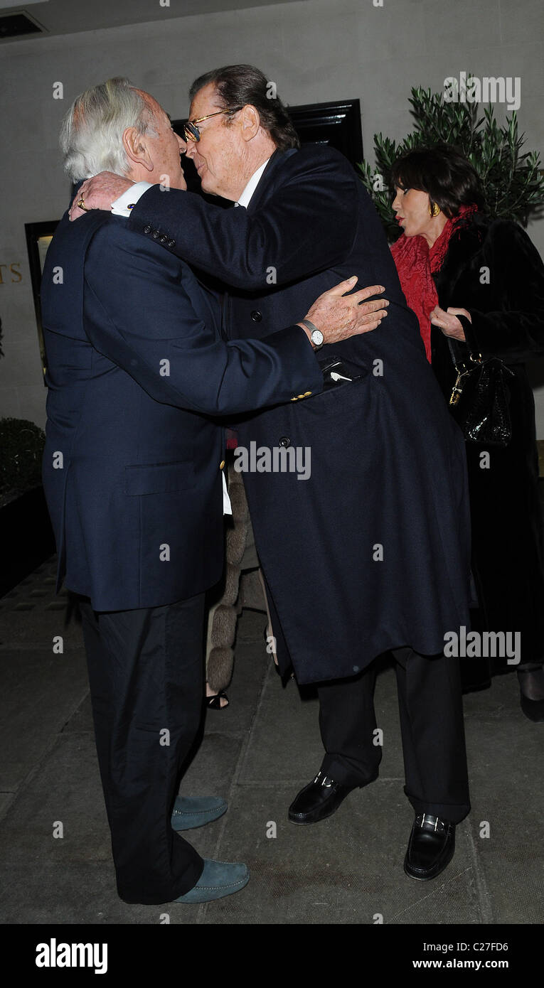 Roger moore, michael caine hi-res stock photography and images - Alamy