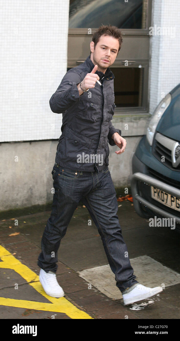 Danny dyer smoking celebrities outside hi-res stock photography and ...