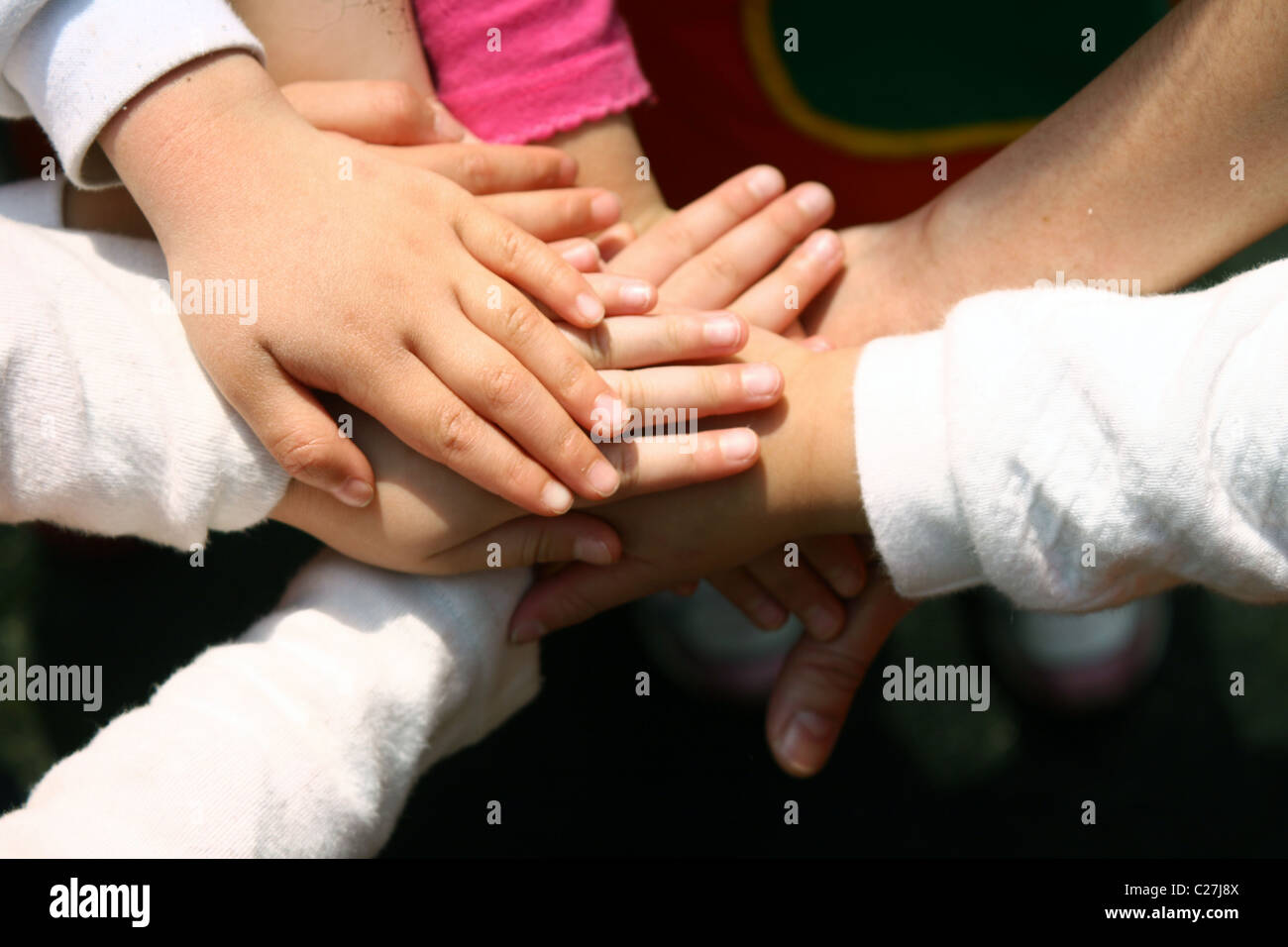 Children's hands raised hi-res stock photography and images - Alamy