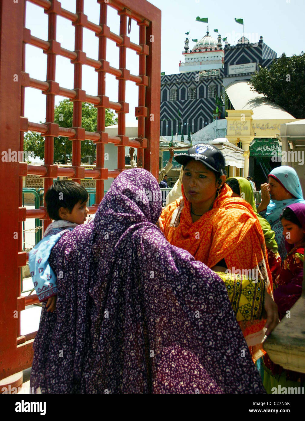 Female security guard search women at the Shire of Hazrat Abdullah Shah ...