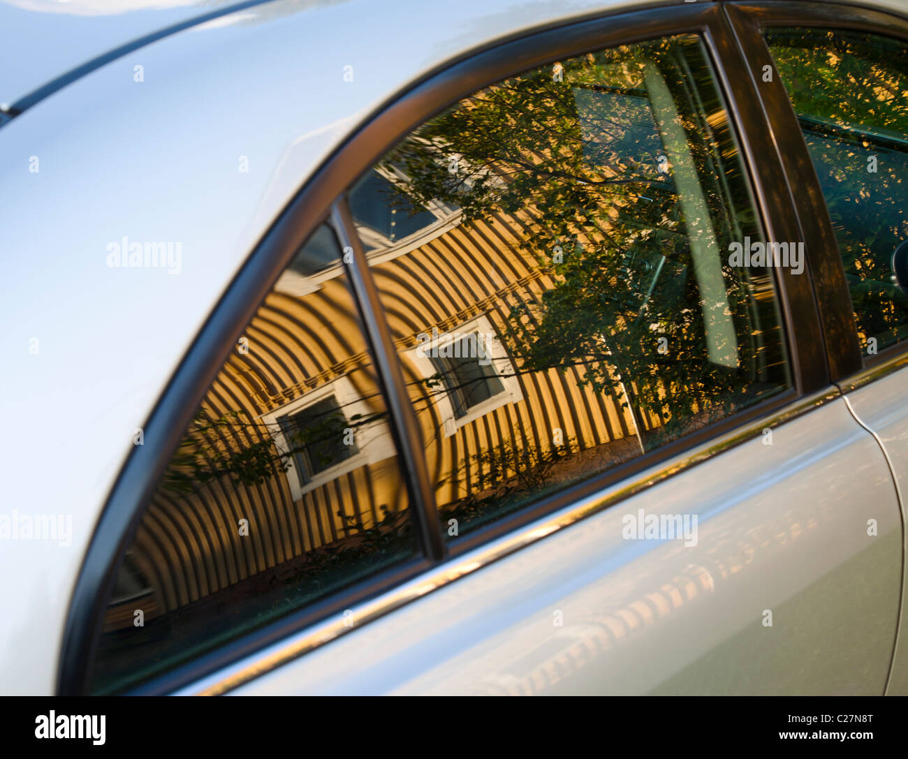 Reflection of a house wall from car window Stock Photo - Alamy