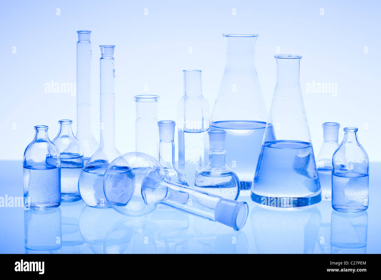 Laboratory glass in blue scenery Stock Photo - Alamy