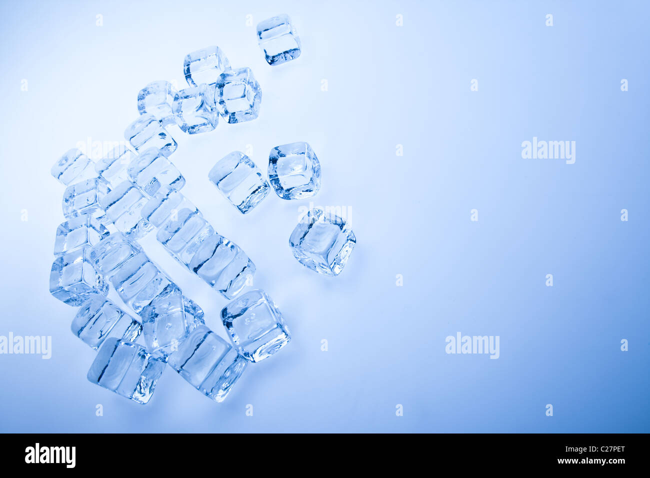Frozen ice cubes over background Stock Photo - Alamy