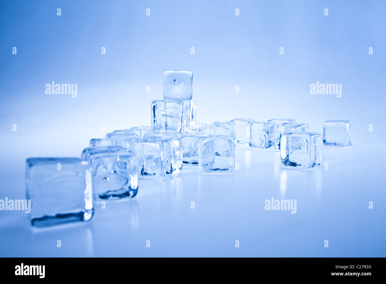Frozen ice cubes over background Stock Photo - Alamy