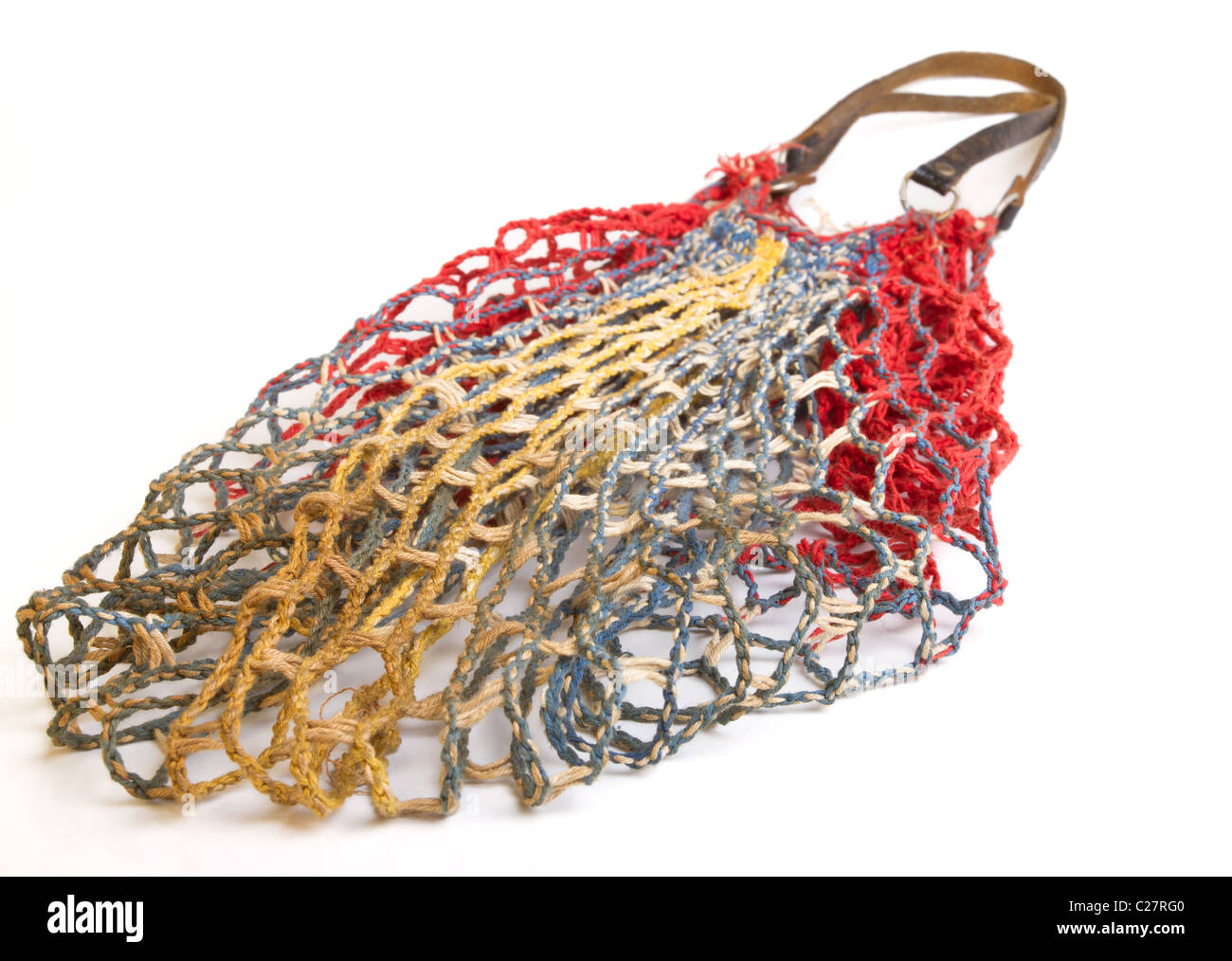 Empty Vintage string shopping bag from low perspective isolated on ...