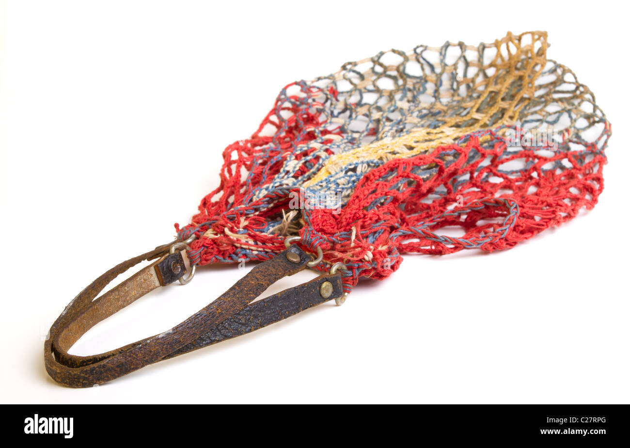 Empty Vintage string shopping bag from low perspective isolated on ...