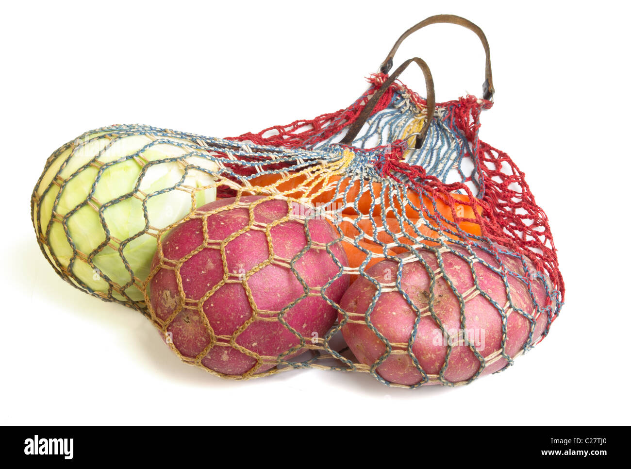 Vintage string shopping bag with veg from low perspective Stock Photo ...