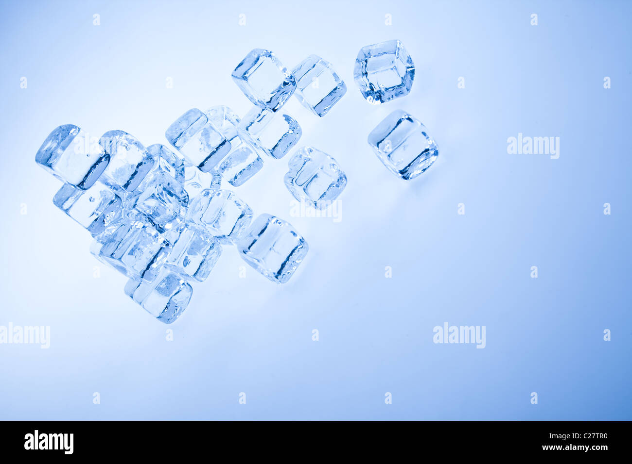 Frozen ice cubes over background Stock Photo - Alamy