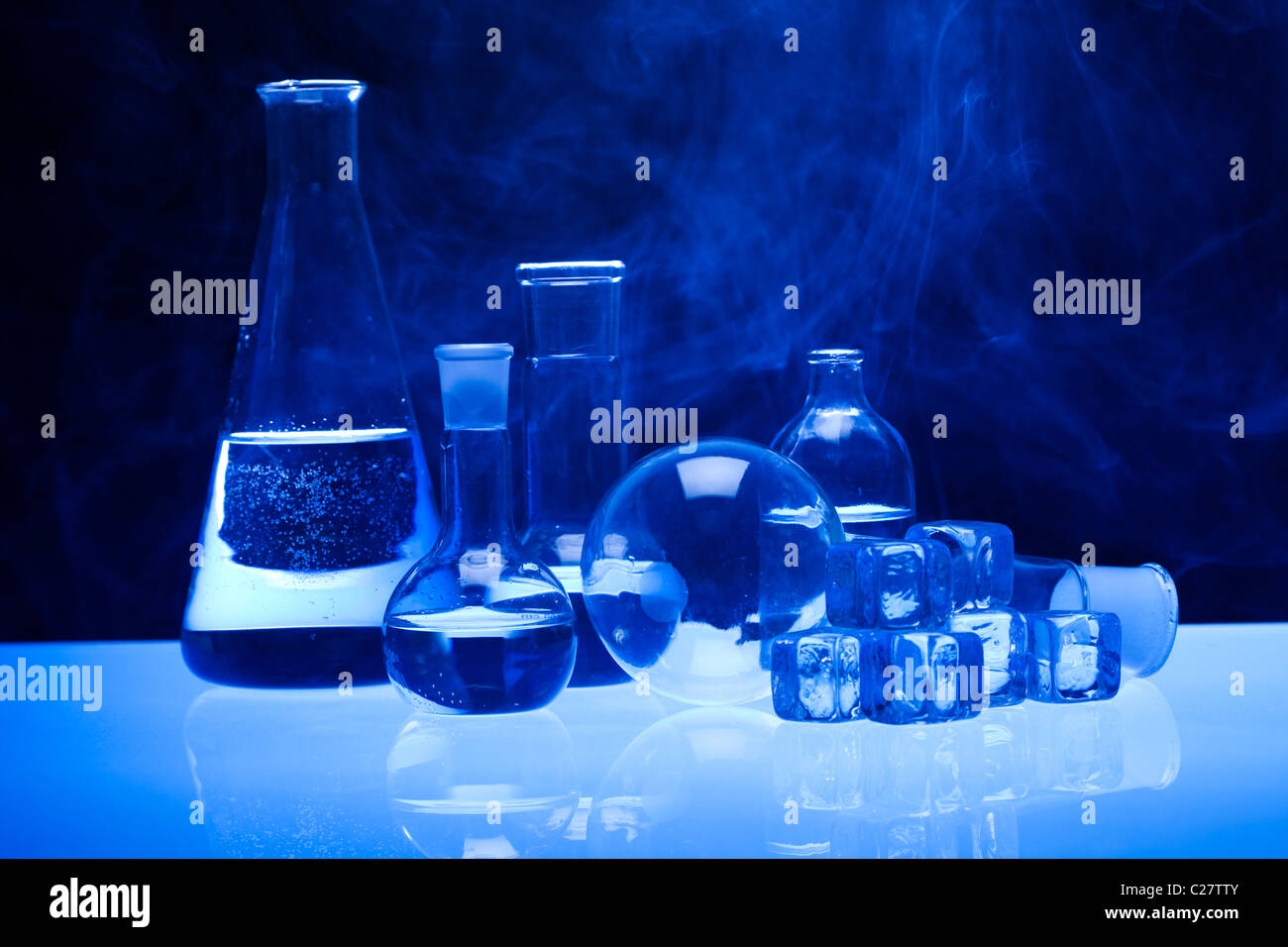 Laboratory glass in blue scenery Stock Photo - Alamy