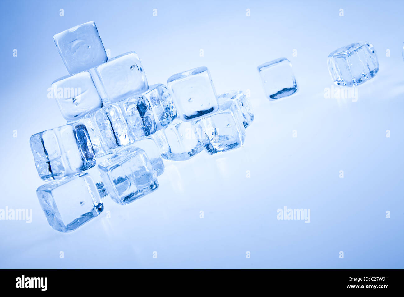 Frozen ice cubes over background Stock Photo - Alamy