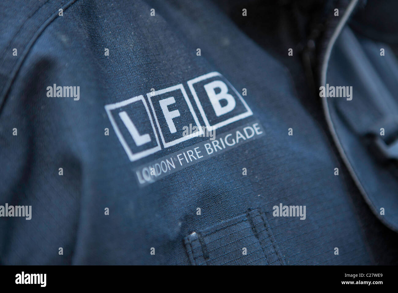 London Fire Brigade, a close up of the logo on a firemans jacket Stock ...