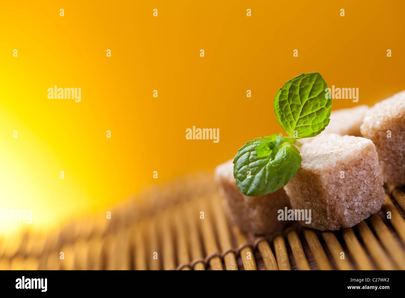 Hot tea over yellow background Stock Photo - Alamy