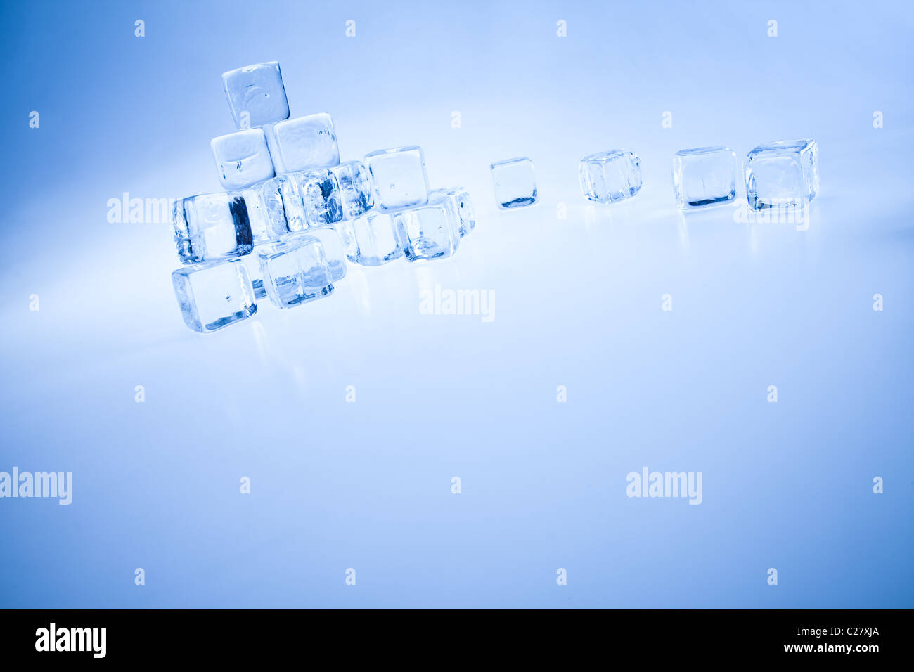Frozen ice cubes over background Stock Photo - Alamy