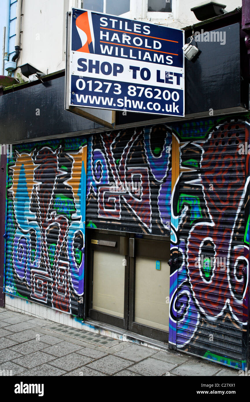 Closed shop shutters hi-res stock photography and images - Alamy