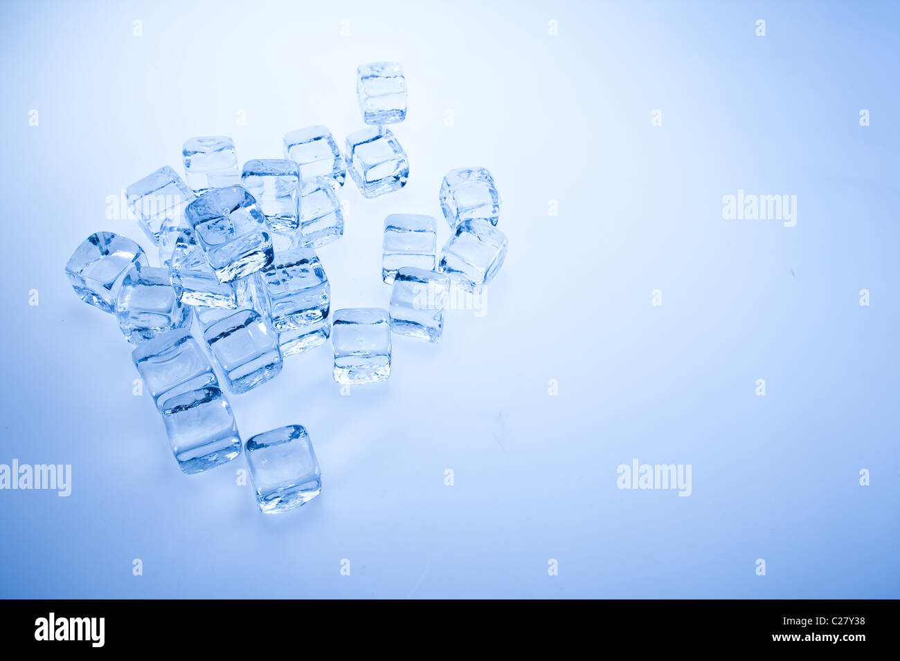 Frozen ice cubes over background Stock Photo - Alamy