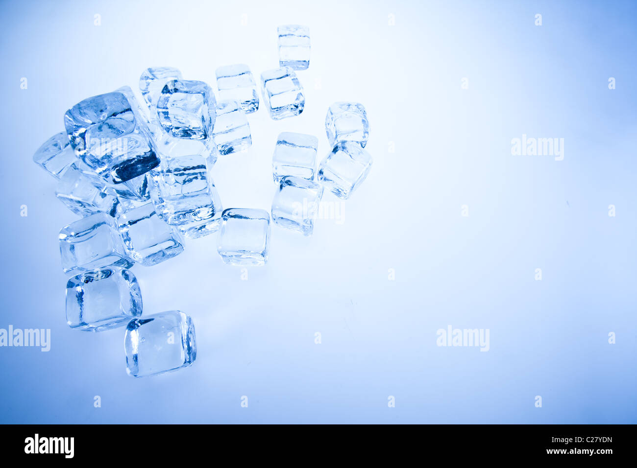 Frozen ice cubes over background Stock Photo - Alamy