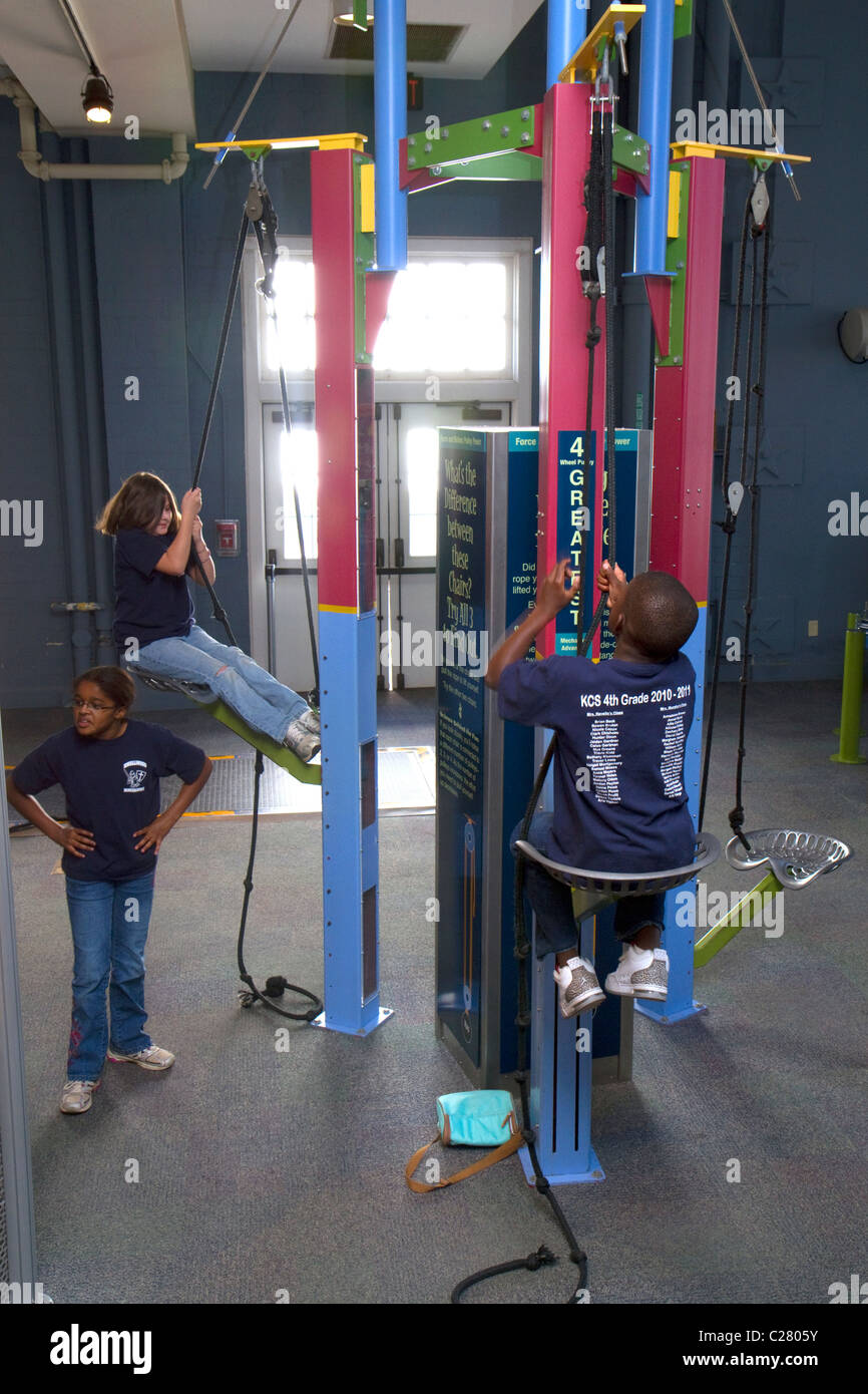 Children using an interactive exhibit at the Gulf Coast Exploreum ...