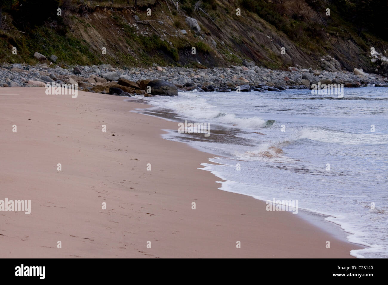 Soft pinks sands and gentle surf at Ingonish Beach, Cape Breton, Nova ...