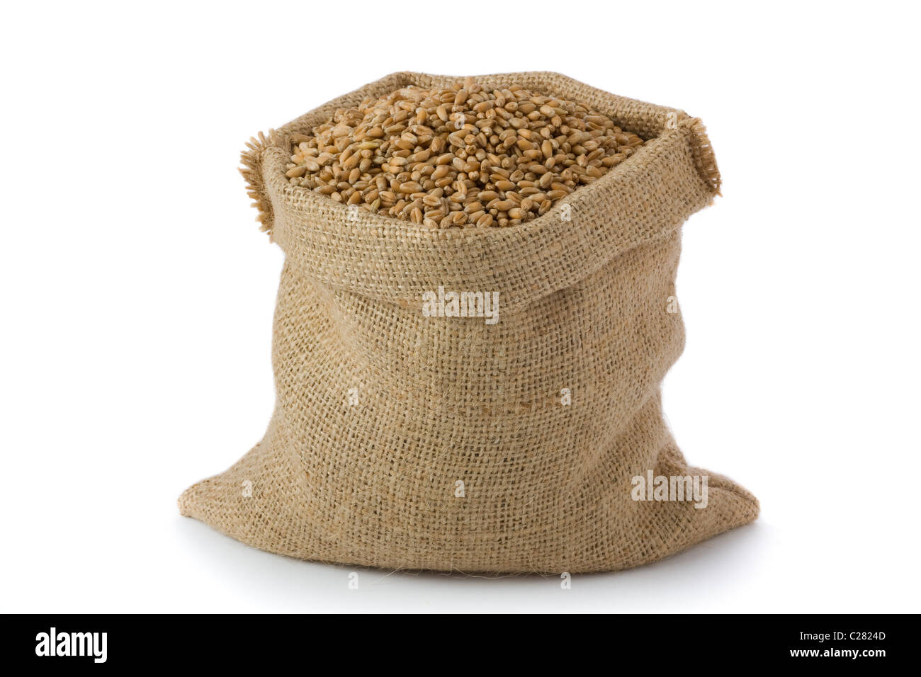 Wheat in small burlap sack Stock Photo - Alamy