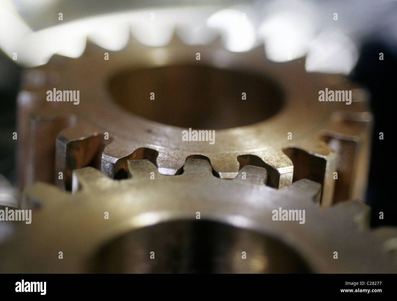 Mechanical gears locked and working together. Heavy industrial ...