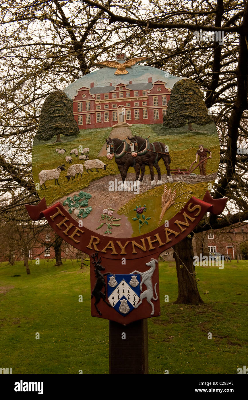 Raynham village sign on the green at Raynham, Norfolk Stock Photo - Alamy