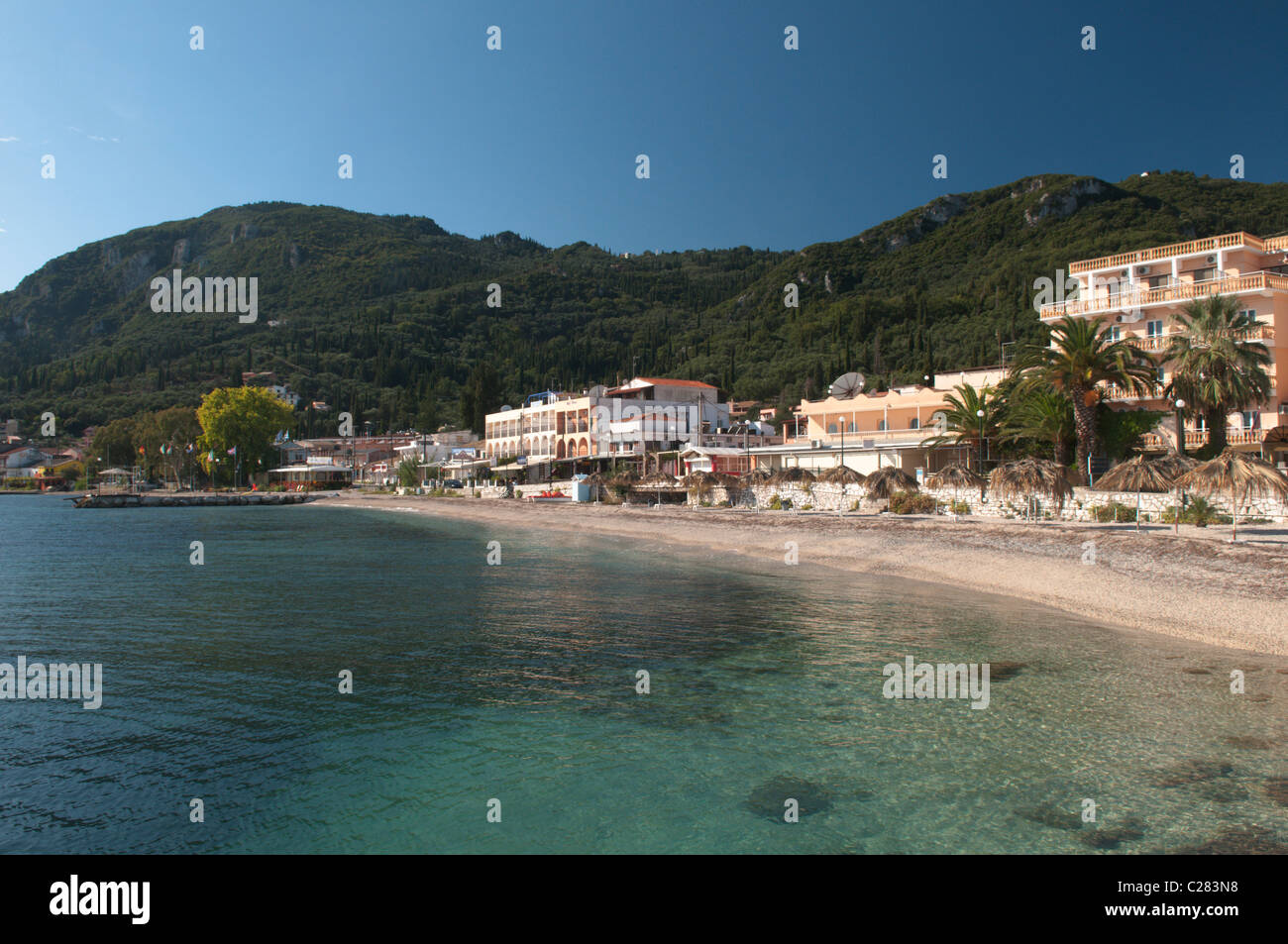 Corfu, Greece. October. The beach at Benitses Stock Photo - Alamy